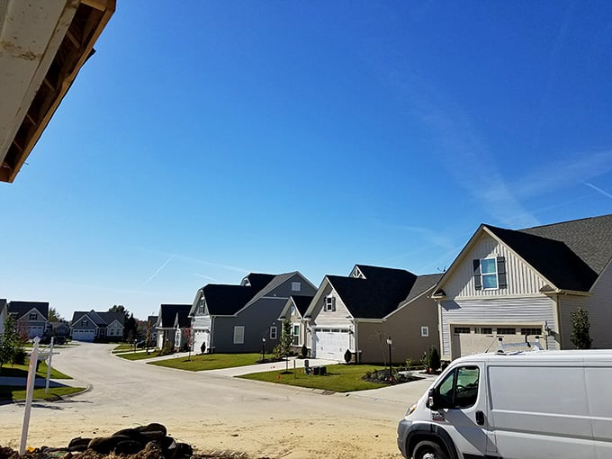 Aurora's fresh craftsman homes curve along a sun-drenched street, looking like the neighborhood everyone on HGTV is desperately trying to find.