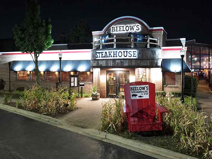 That big red chair out front isn't just decor. It's Beelow's way of saying, "Pull up a seat, the steaks are ready."