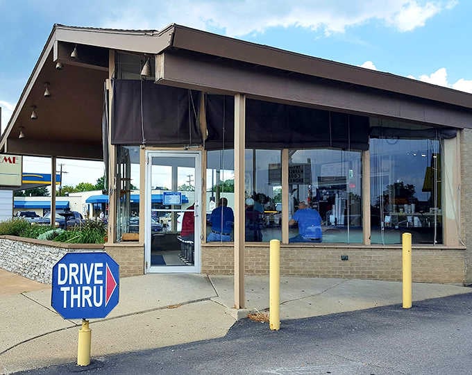 That drive-thru sign is basically a permission slip to treat yourself without even unbuckling your seatbelt.