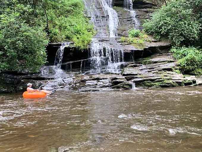 Nature's own water park features a cascading waterfall that turns tubing into an unforgettable mountain adventure.