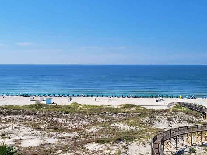 Those natural dunes and sea oats frame the pristine beach like nature's own postcard, no filter needed whatsoever.