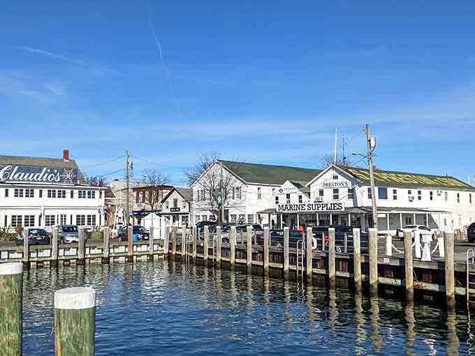 Classic white buildings frame the harbor where boats bob gently and the seafood is fresher than your morning newspaper.