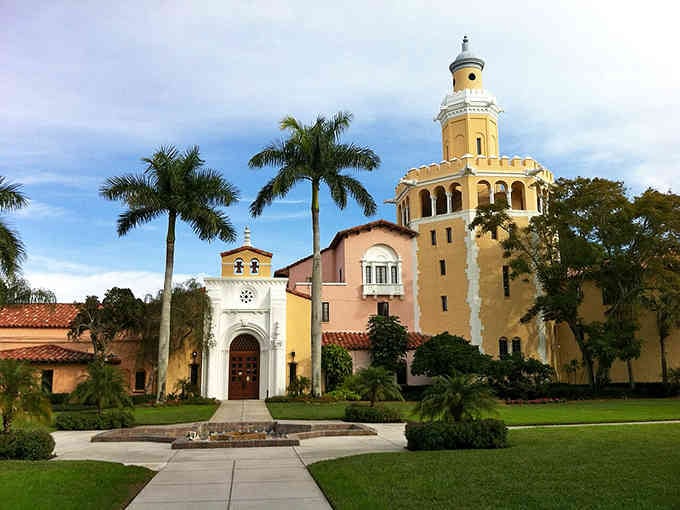 Mediterranean-style architecture meets Florida sunshine at this stunning campus, where palm trees sway against pastel-colored towers and pristine lawns.