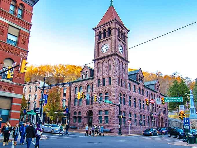 Jim Thorpe's red sandstone clock tower rises against autumn hills like a scene from a Dickens novel.