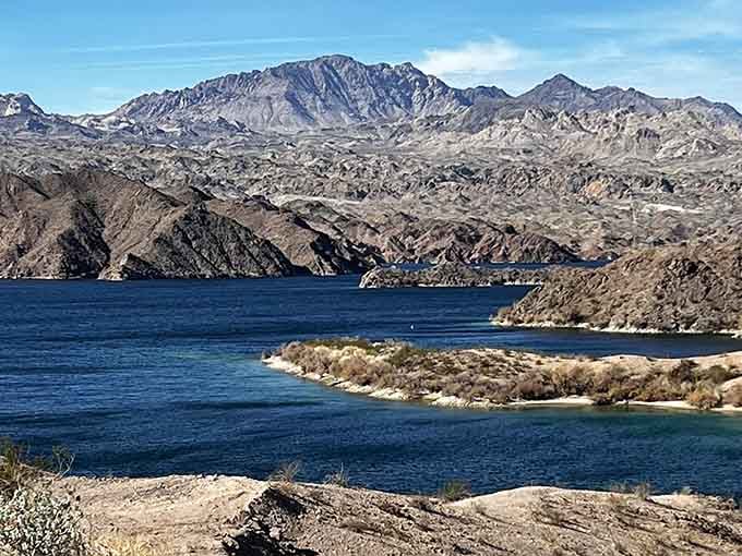 Lake Mohave tucks itself between rugged peaks like it's hiding something truly spectacular, and it is.