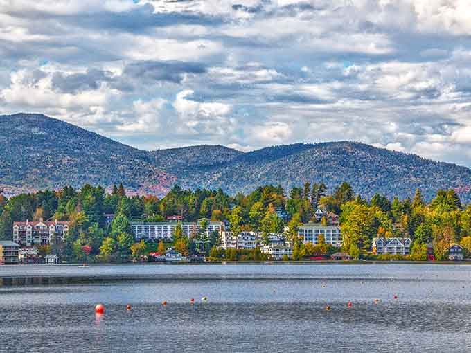 Mirror Lake reflects the Adirondack peaks so perfectly you'll wonder which side is right-side up, honestly.