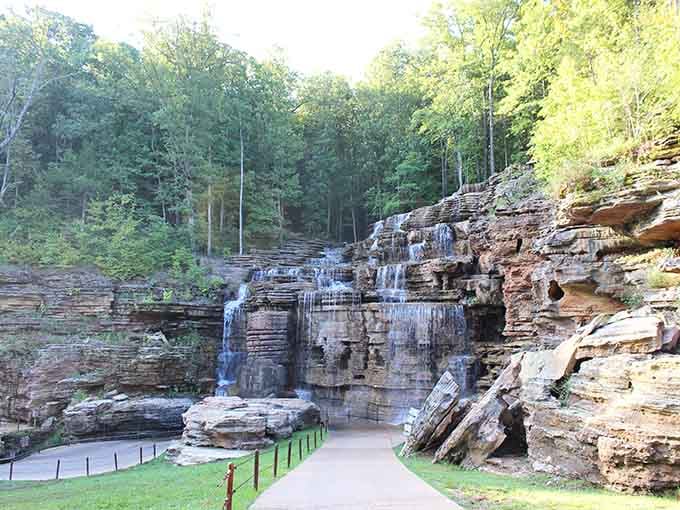 Towering rock walls frame this paved path through what used to be underground&mdash;talk about dramatic!