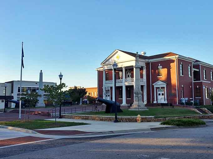 Martinsville's stately courthouse glows at dusk, with cannons out front reminding everyone this town has real backbone.