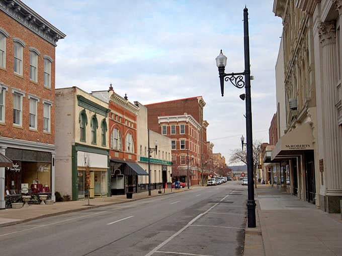 Wide streets and elegant lamp posts frame a riverfront town where history isn't just preserved, it's celebrated every single day.