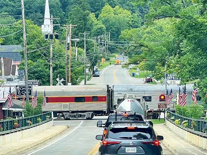 A classic train rolling through Peninsula's main crossing is the kind of moment that makes you reach for your camera every single time.