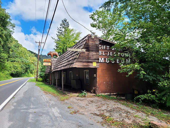 A bear on the rooftop and faded signage on the walls tell you this mountain roadside stop means serious business.