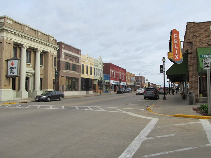 The Felix Theater sign glows like a beacon for anyone seeking authentic small-town movie magic.