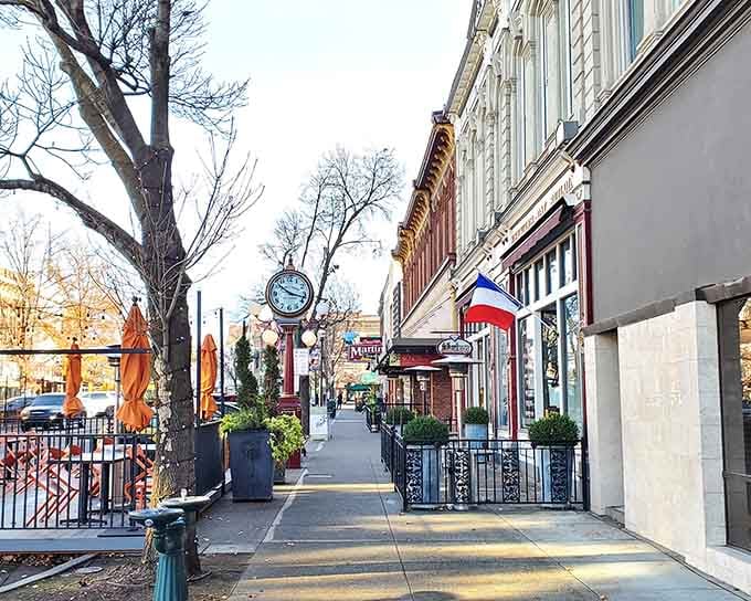 Walla Walla's sidewalk clock and bistro flags say "slow down, stay awhile, and maybe try the wine."