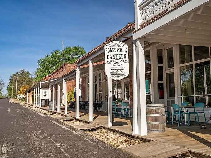 The Boardwalk Canteen's hand-painted sign and whiskey barrel out front say everything you need to know about Arrow Rock's easygoing charm.