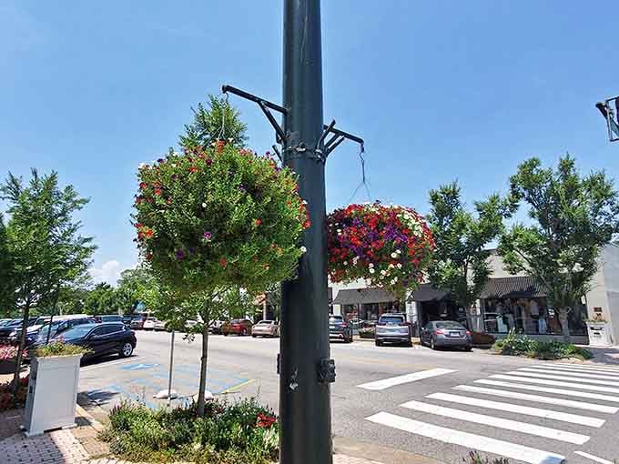 Hanging baskets burst with color above crosswalks that lead to dining discoveries waiting around every welcoming corner in town.