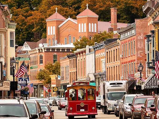 A red trolley rolling through Galena's brick-lined streets with autumn trees blazing behind a church steeple? Yes, please.