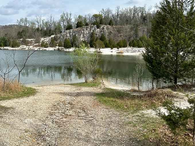 Limestone bluffs rise dramatically behind the quarry lake's glassy surface, making this Missouri treasure look suspiciously like a European postcard.