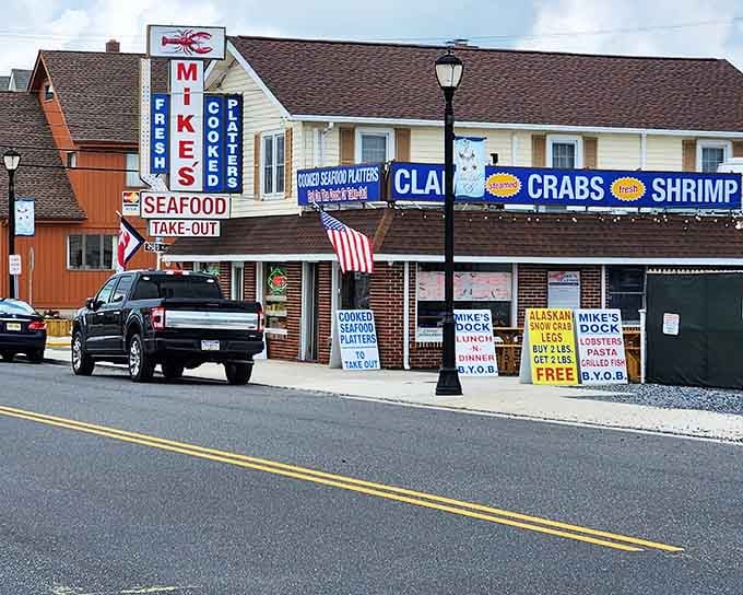 Mike's Dock is flying the American flag and advertising Alaskan snow crab legs, which is a combination nobody should argue with.