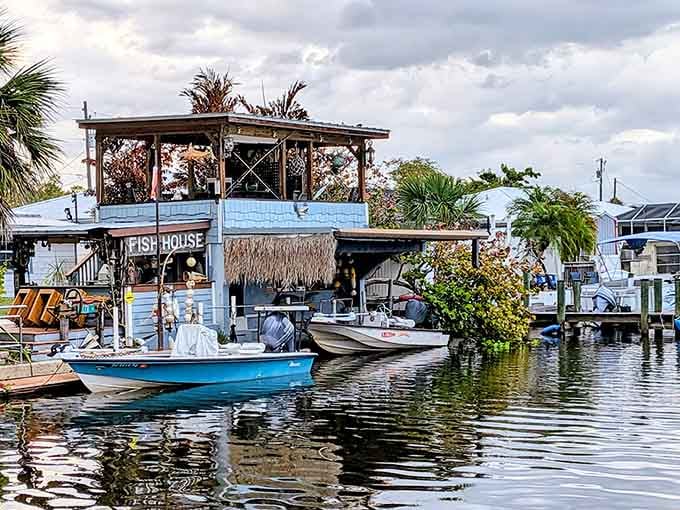 Boats tied up, thatched roof overhead, and the Peace River right there &mdash; Nav-A-Gator looks like a postcard Florida forgot to mail.