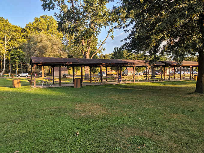 Golden hour hits these New Philadelphia picnic shelters just right, turning an ordinary park into something that belongs on a postcard.