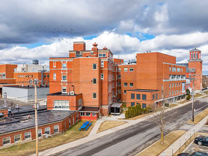 These stacked brick buildings rising against a dramatic cloudy sky give Ogdensburg a quietly powerful, no-nonsense personality.