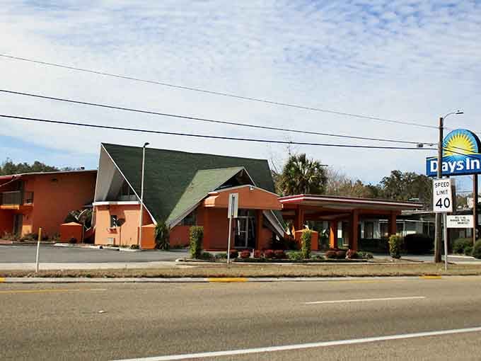 A Days Inn with a roofline that dramatic deserves its own architectural award — Perry keeps surprising you.