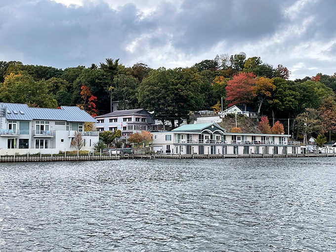 Fall foliage tumbles down the hillside toward Kalamazoo Lake, painting Saugatuck in colors that no filter could improve.
