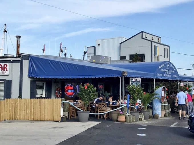 Under that big blue canopy, happy diners surrounded by tropical plants prove that Point Pleasant knows how to do seafood right.