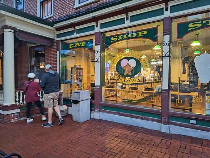 Two people peering through glowing windows at ice cream cones is the most relatable thing you'll see all week.