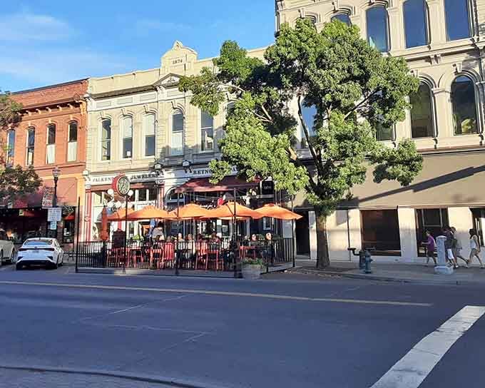 Orange umbrellas, golden evening light, and historic brick buildings &mdash; Walla Walla knows exactly how to set a scene.