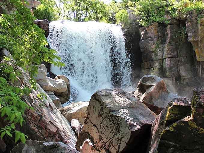 Framed by lush green leaves and mottled stone, Winnewissa Falls feels like a secret worth keeping forever.