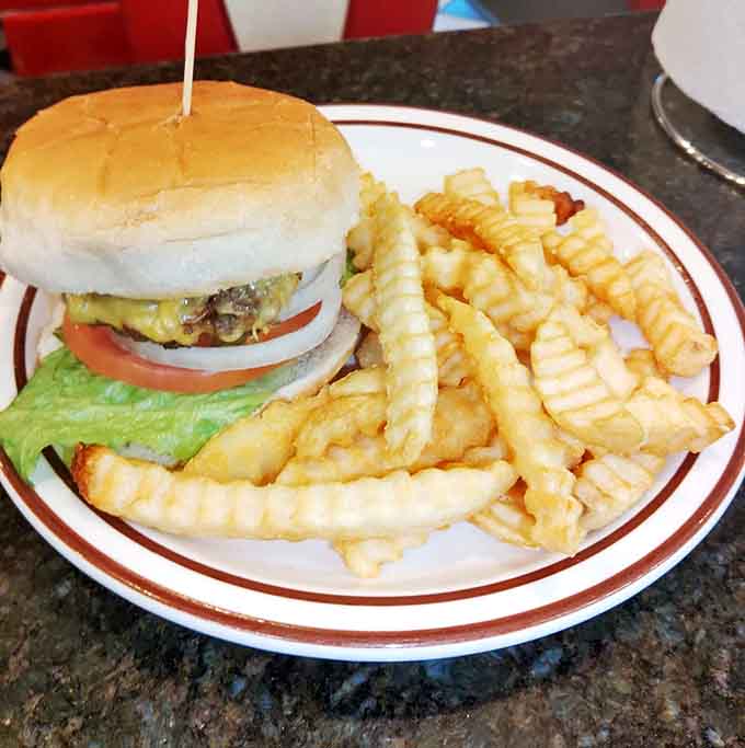 That burger isn't just lunch. It's a handmade, crinkle-fry-accompanied argument for slowing down and savoring life.
