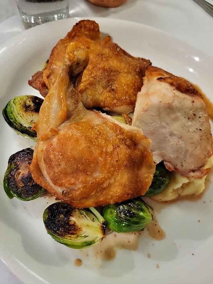 Golden-skinned chicken with perfectly charred Brussels sprouts proves simple ingredients shine when treated with respect and skill.