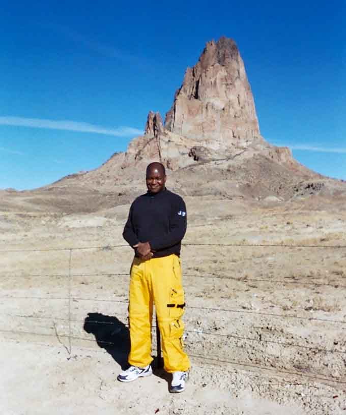 Scale meets spectacle: Agathla Peak makes everything around it look like a miniature model railroad.