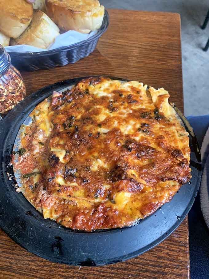 This bubbling, golden-topped lasagna looks like it could solve most of life's problems, or at least the hunger-related ones.