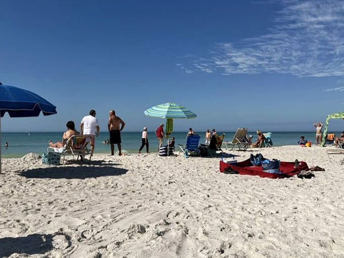 Colorful umbrellas, powdery white sand, and zero high-rises in sight. This is what a proper Florida beach day actually looks like.