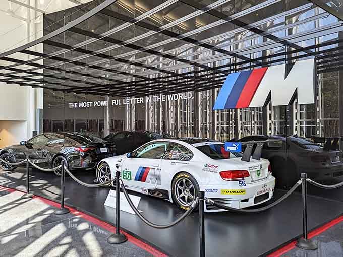 Racing heritage on full display, because sometimes the most powerful letter in the world deserves its own exhibit.