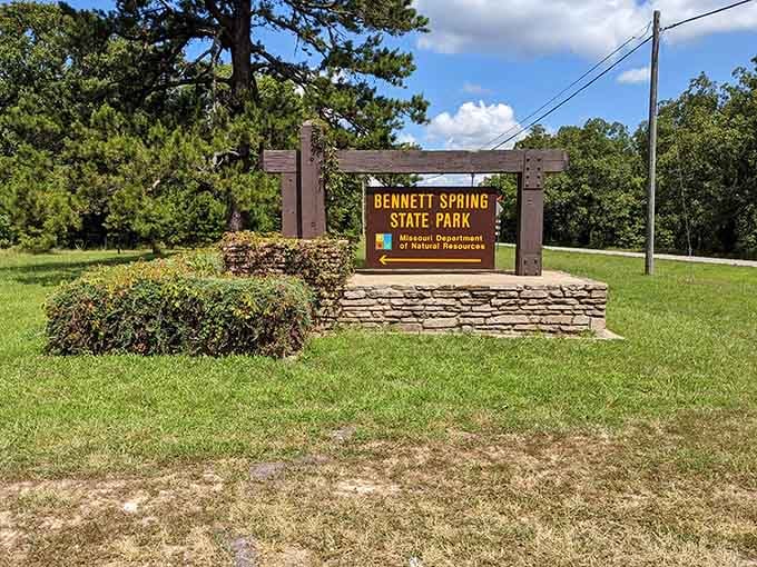 That wooden sign sitting on stacked stone isn't just marking an entrance, it's making a promise worth keeping.