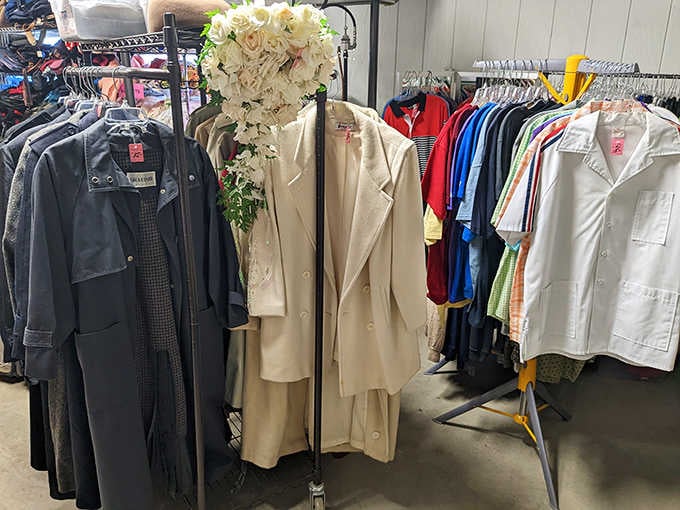 Vintage coats, blazers, and colorful shirts hang here, waiting for someone with excellent taste to claim them.