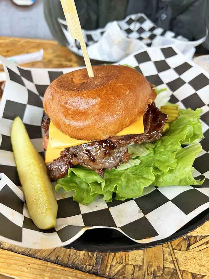 That glossy brioche bun hiding a bulgogi-style rib-eye patty is proof that Lakewood's burger scene means serious, delicious business.