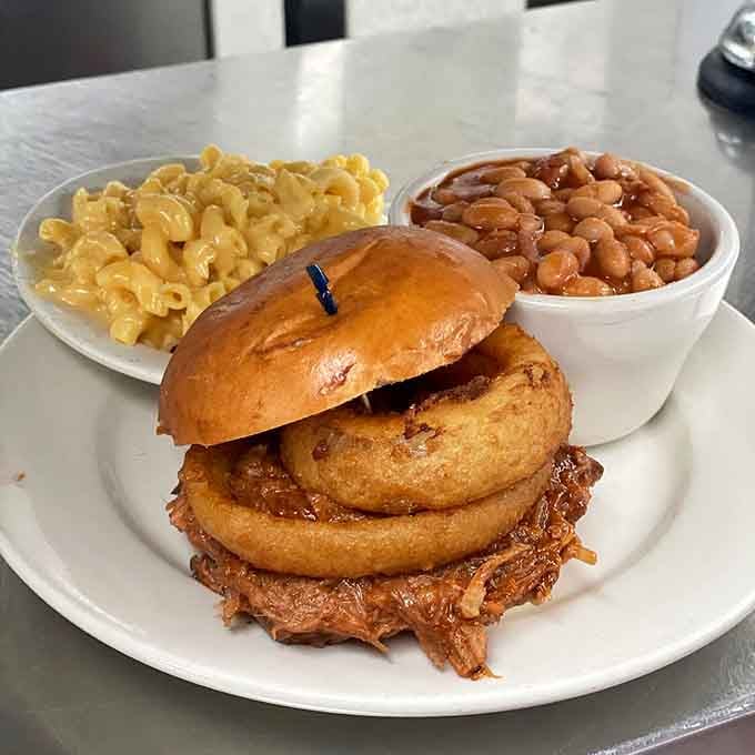 Pulled pork piled high with onion rings, plus mac and cheese on the side. Friday never looked this good.