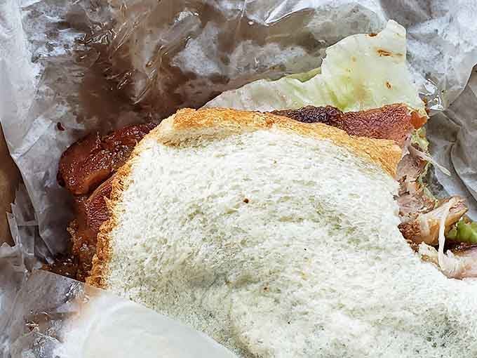 A pork chop sandwich wrapped in wax paper is the universe's way of telling you everything is going to be just fine.