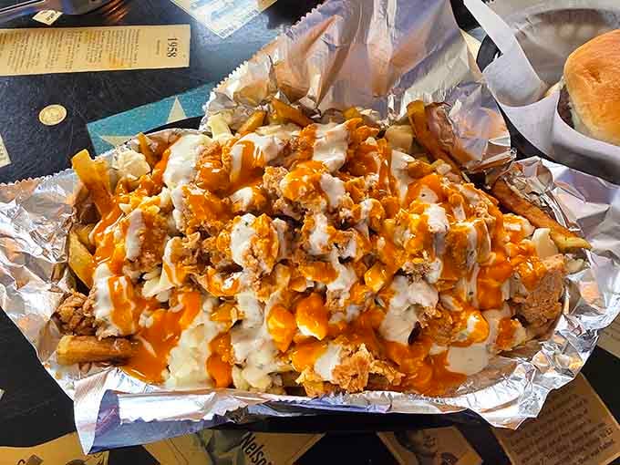 Buffalo chicken poutine proves that international diplomacy is best conducted through cheese curds, gravy, and hot sauce.