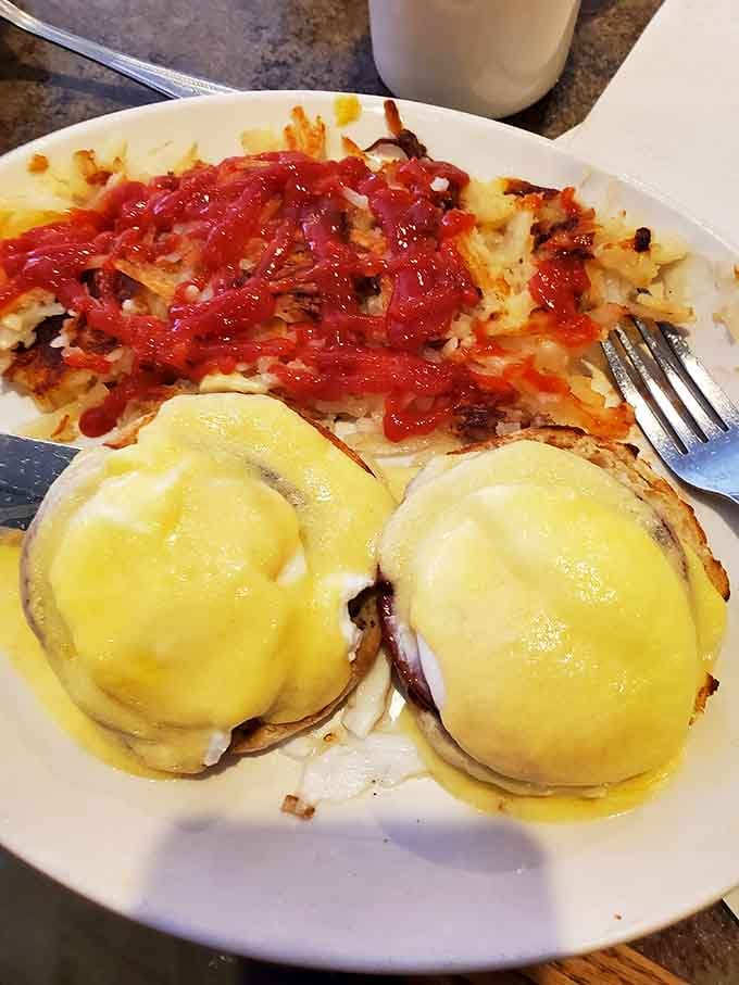 Eggs Benedict so perfectly golden and glossy, they deserve their own spotlight and a standing ovation.