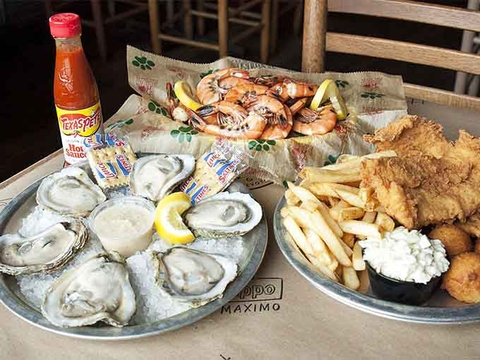 Raw oysters, peel-and-eat shrimp, and fried fish all on one table. Someone at Bubba's really understands happiness.