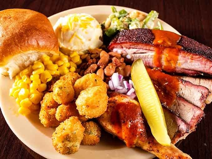 BBQ ribs, fried okra, pinto beans, and a dinner roll, this plate is a Southern symphony in one sitting.