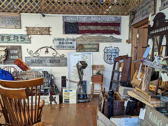 Old wooden signs, a Route 127 marker, and a "Sleigh Repair" board walk into a bar. This is that bar.