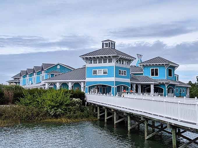 The Oyster Farm Resort rises over the water like a Caribbean dream that somehow landed on the Chesapeake Bay and decided to stay.