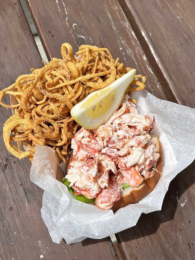 That lobster roll with crispy onion strings proves simple preparations often create the most memorable meals.