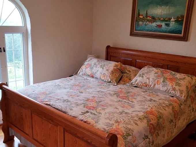 Wake up in a bedroom with arched doorways and realize your commute is just a spiral staircase away.